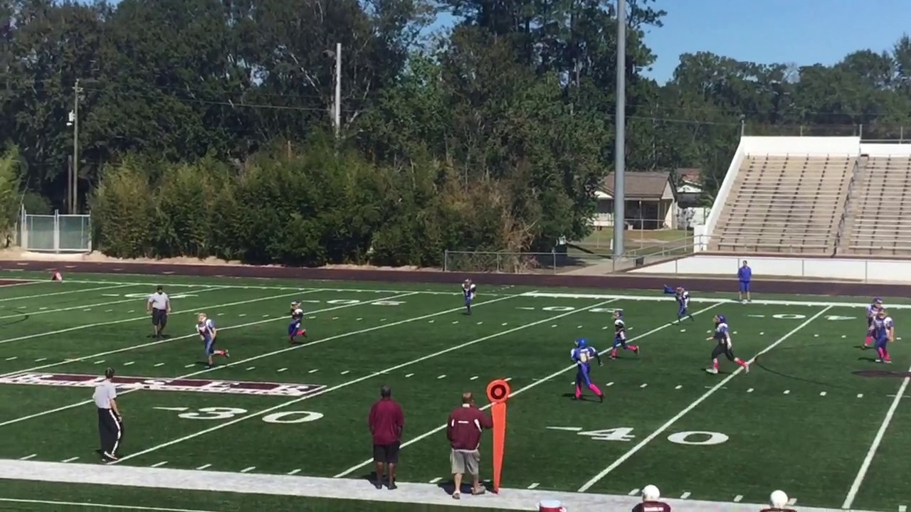 6th Grader kicking football 40 yards in the air AND HIGH!! - YouTube