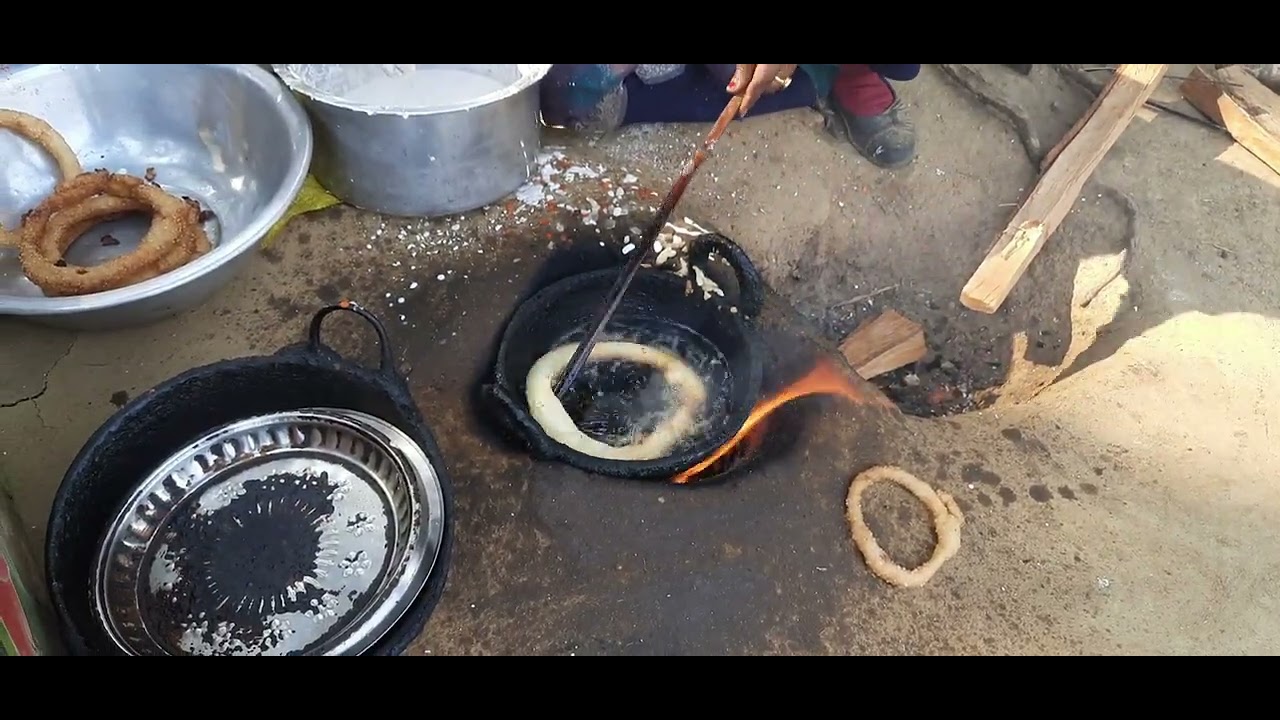 Eating sel roti at Kanyam, Illam. - YouTube