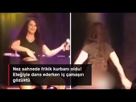 Sahnede dans ederken eteği açılan Nez'in iç çamaşırı gözüktü