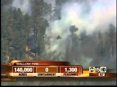 Crews trying to save homes from the Wallow Fire - YouTube