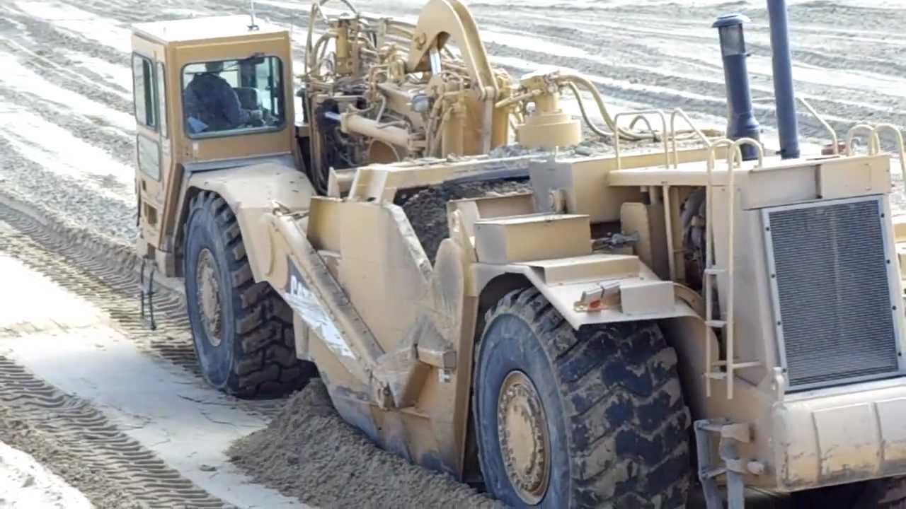 627G Auger Scraper in Sand - YouTube