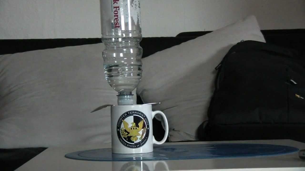 Water Bottle balancing on a spoon on a cup WOW - YouTube