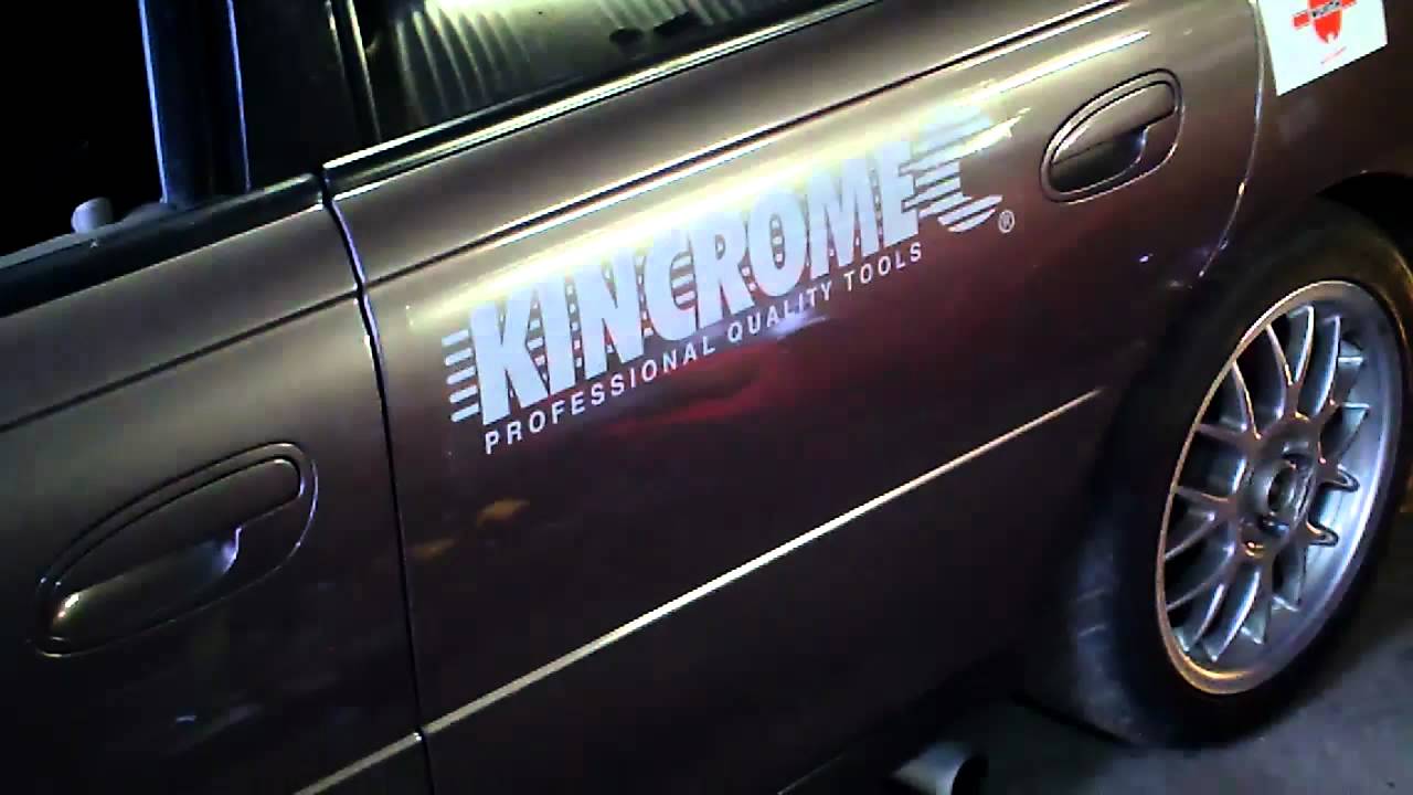 vt commodore race car running with a side pipe - YouTube