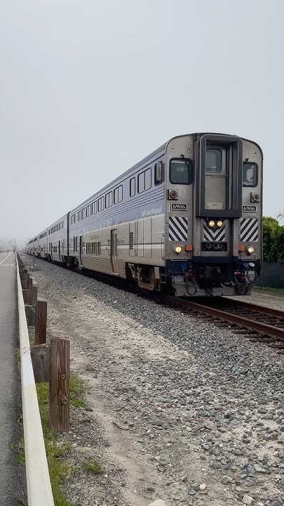 Amtrak 573 passing through San Clemente with Cab car 6906 and with P42DC 189 trailing behind ...