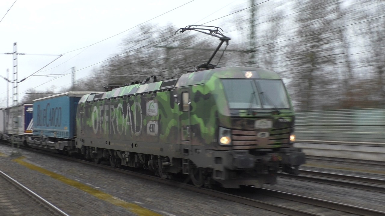 "OFFROAD" Electric Locomotive with Intermodal Train passing station ...