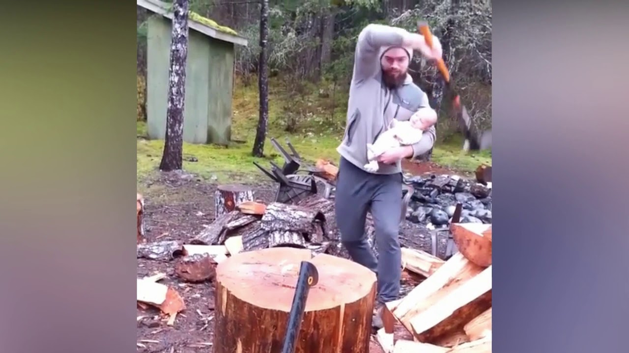 Dad Chops Wood while Carrying Baby - YouTube