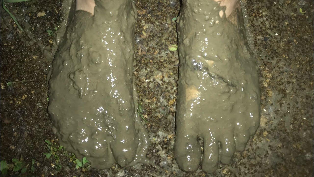 Barefoot in wet soft mud - YouTube