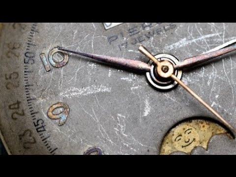 Hand polishing silver back onto a vintage 1940s Pierce watch - pure technique