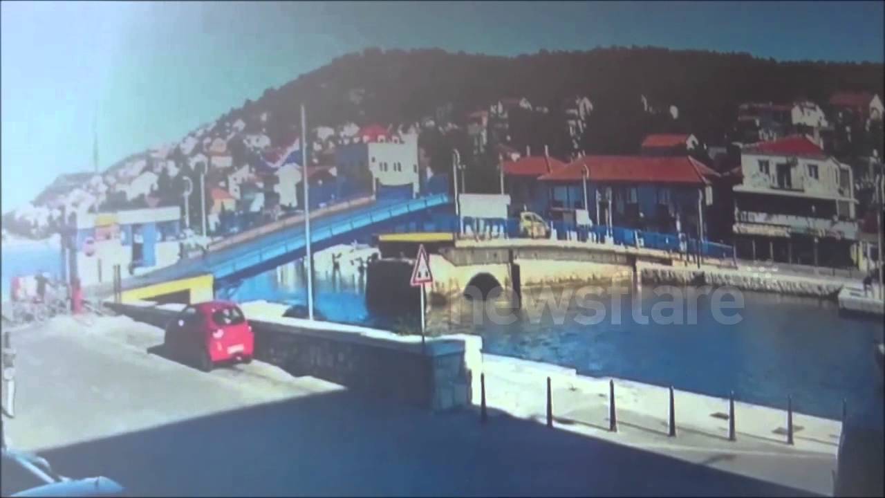 Car jumps across rising bridge in Croatia - YouTube