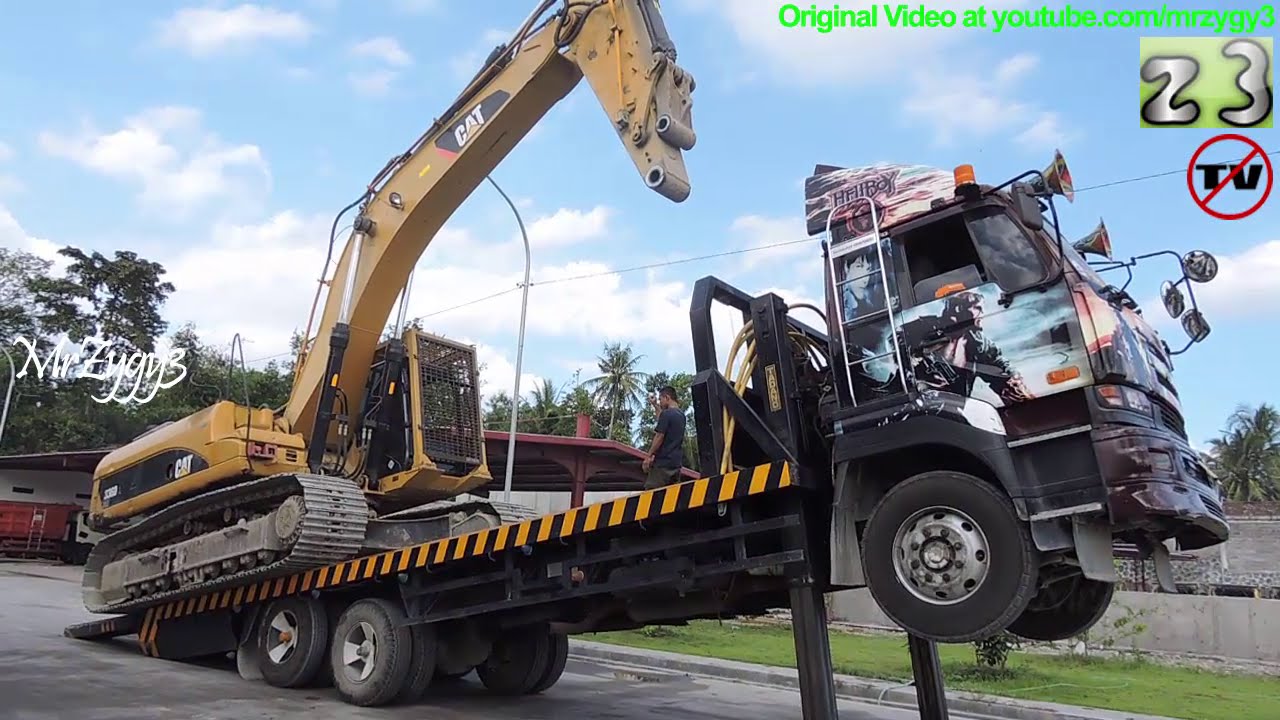 UD Self Loader Truck Moving Excavator CAT 336DL ME 320D - YouTube
