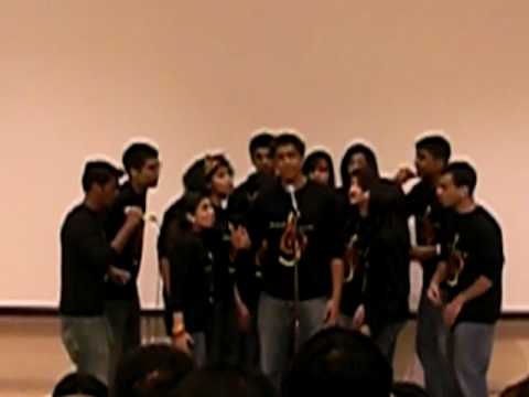 indian group singing a song from omshantiom - YouTube