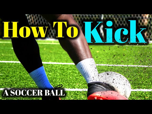 A Foot Kicking A Soccer Ball