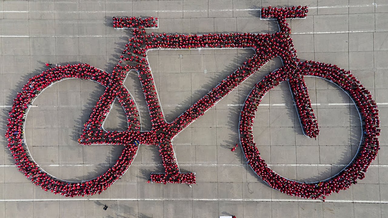Chileans aim to create the world's largest human bicycle - YouTube
