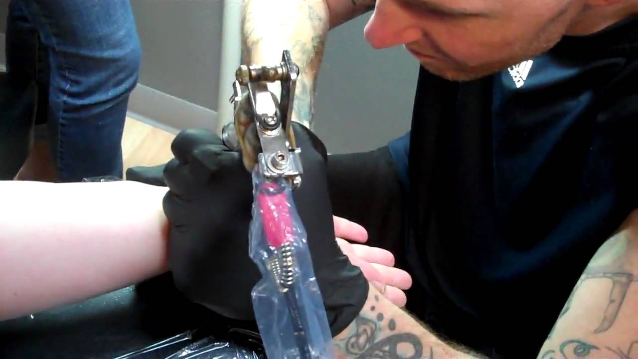 Sarah's Guitar Pick Tattoo - YouTube