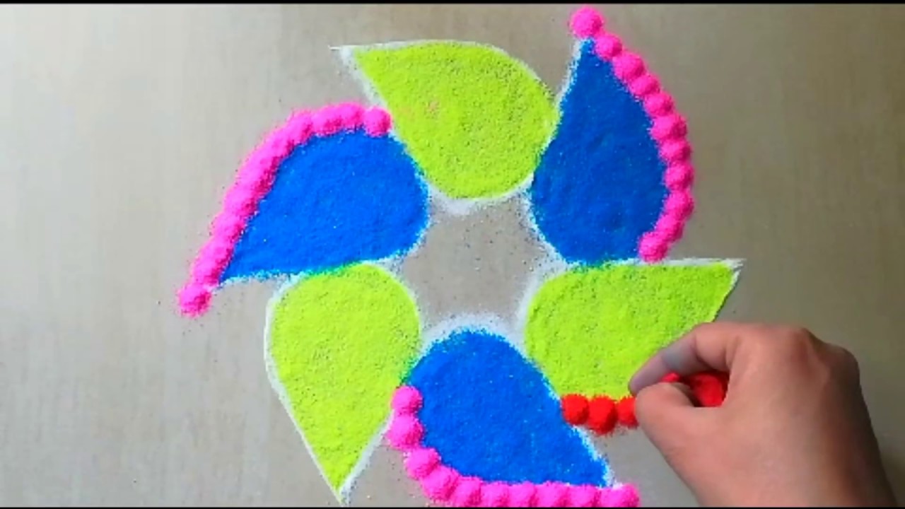 Very creative and beautiful rangoli design - YouTube