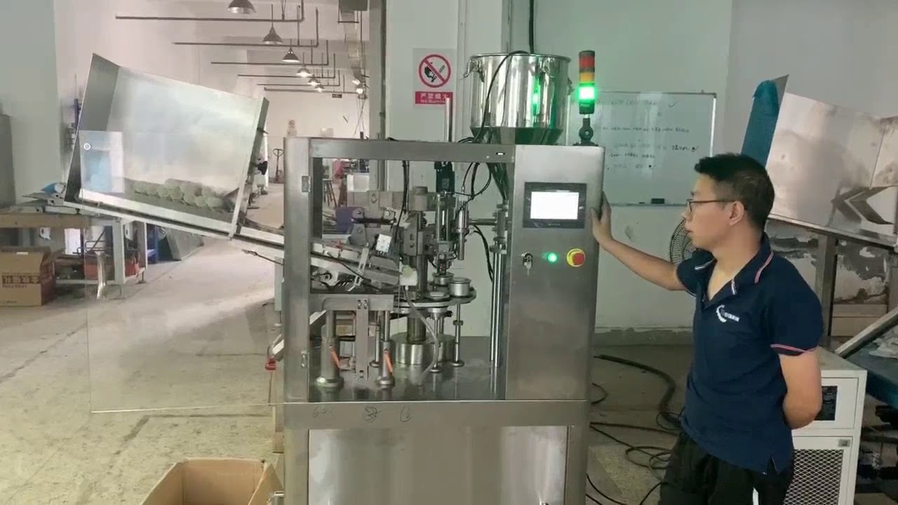 Fully auto cosmetics tube filling sealing machine - YouTube