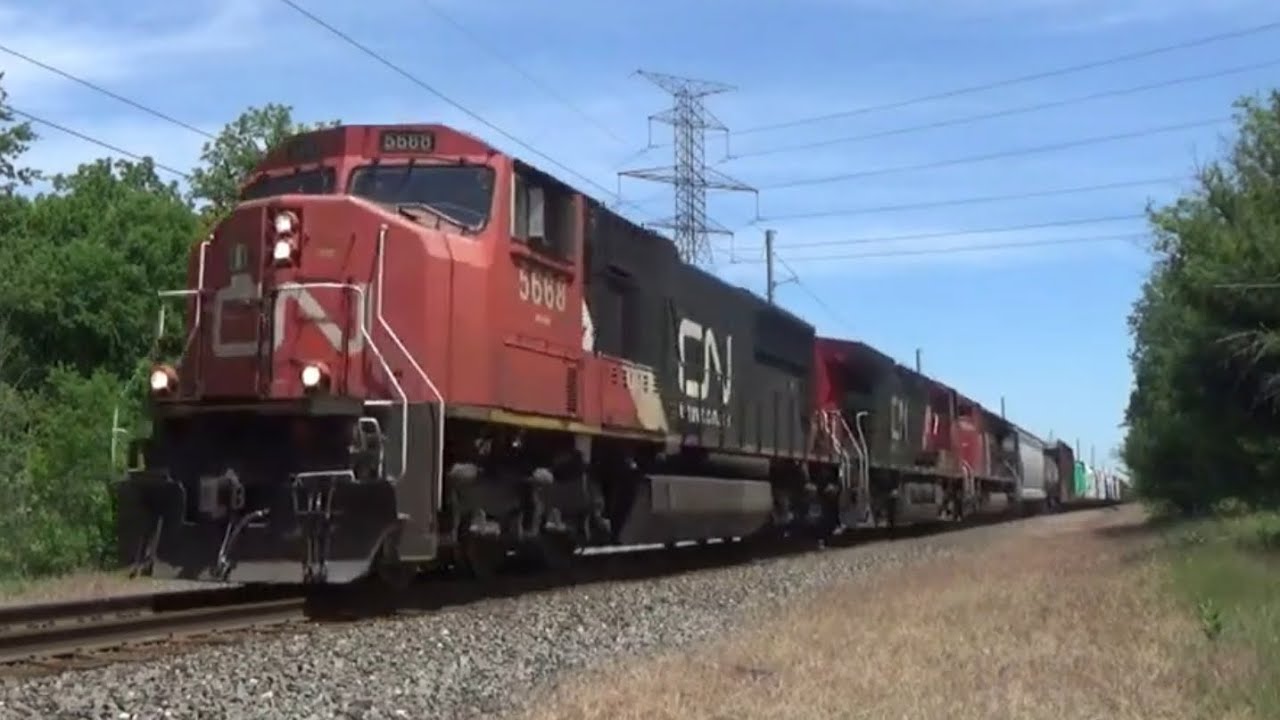 CN and CSX Trains In Michigan Late May 2024 FT SD75I leaders and more ...