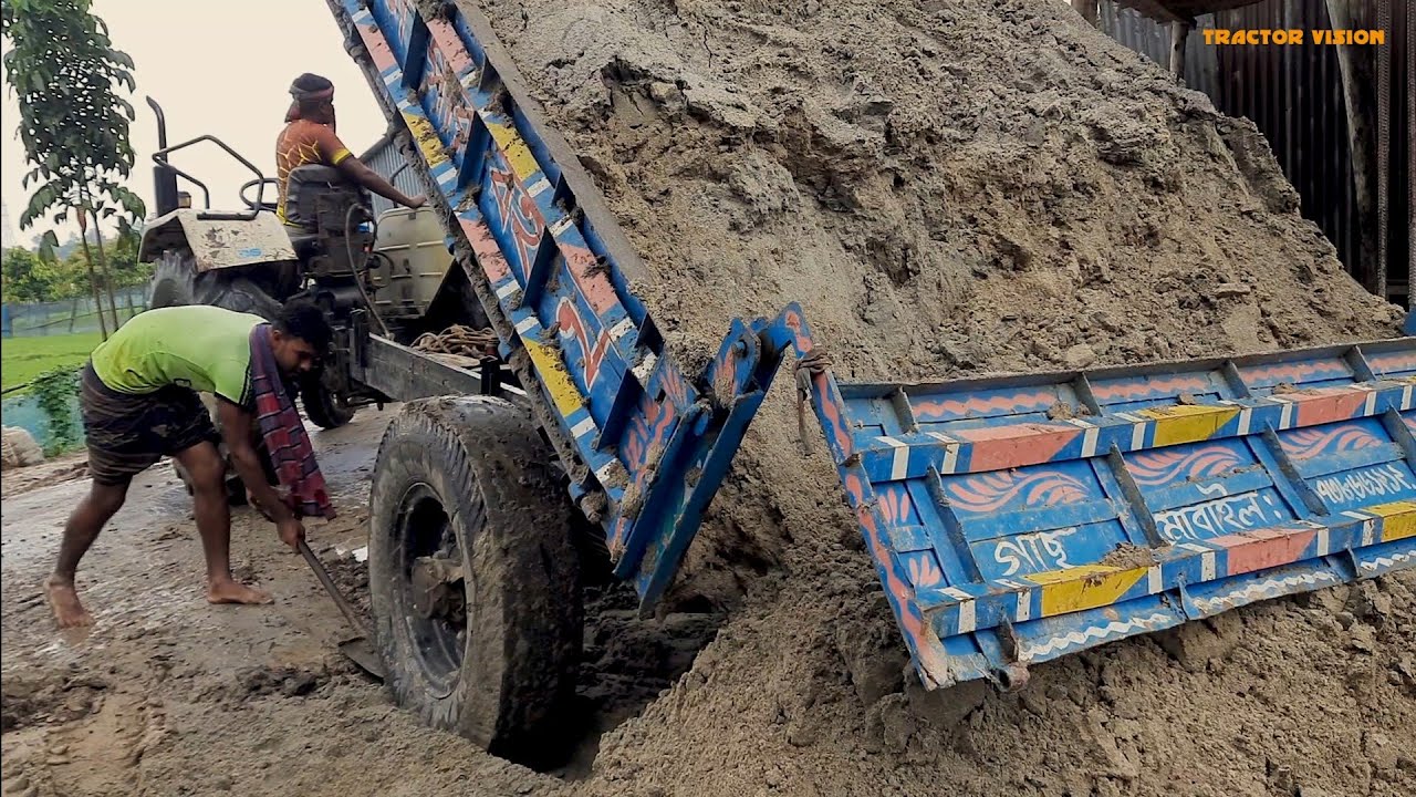 Sand load tractor in The Biggest River Unloading Digital hydraulic ...