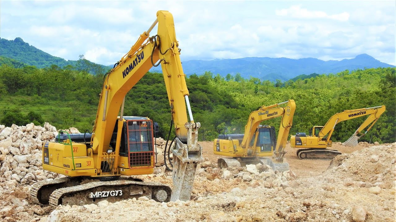 Excavator Digging New Limestone Road - YouTube