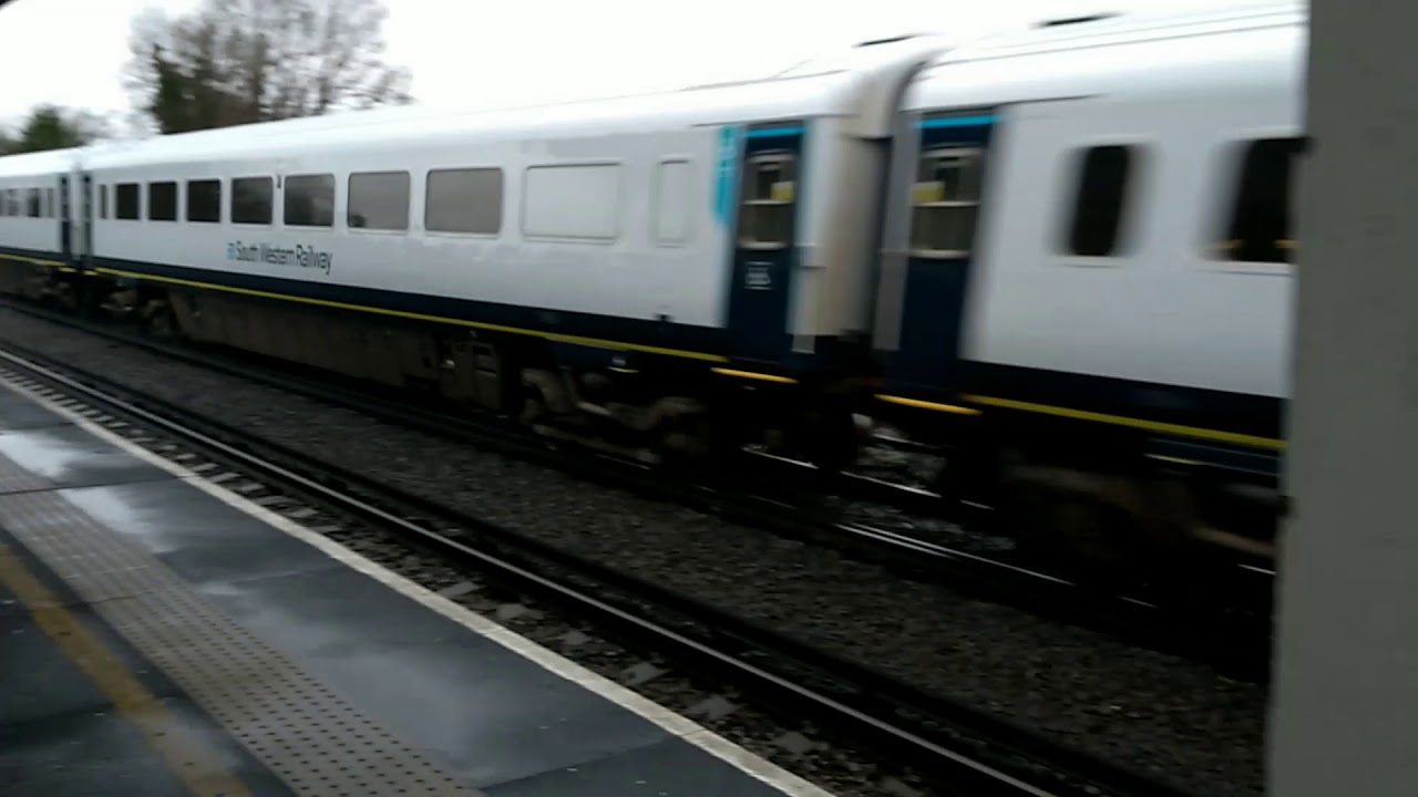 South Western Railway class 442 passes Hersham at speed - YouTube
