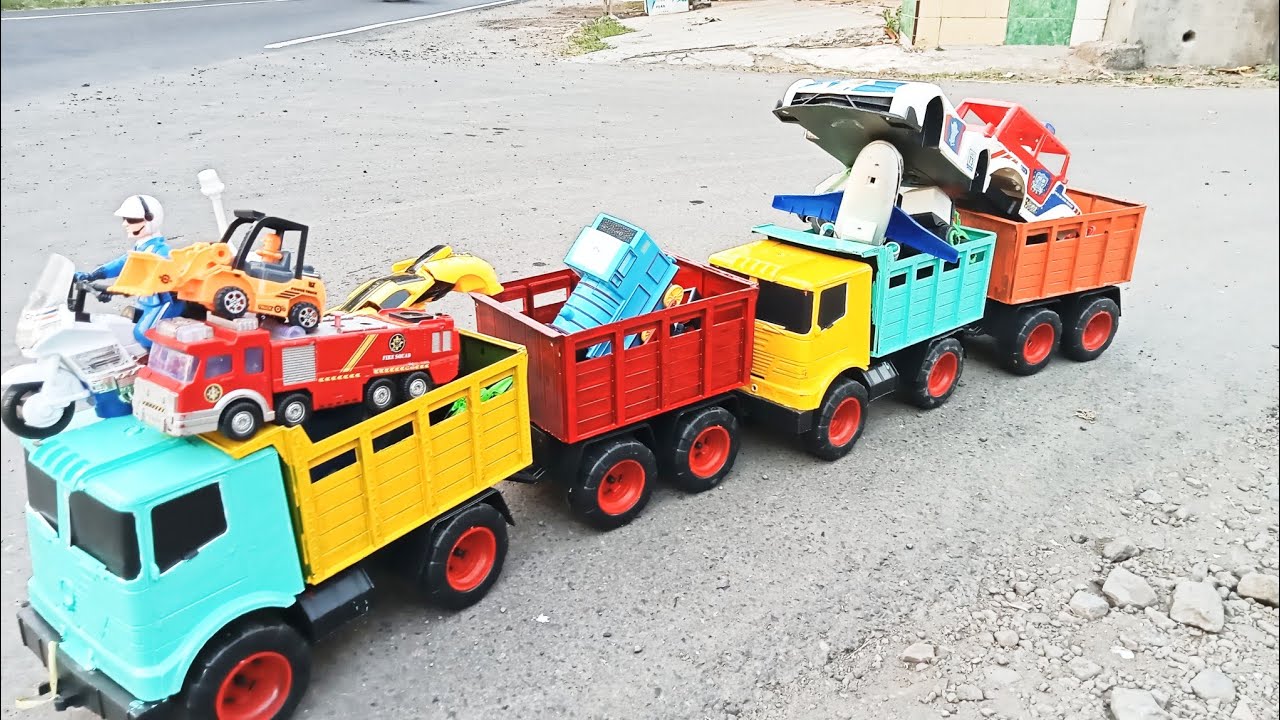 Truk oleng tronton panjang muat buldoser bego keruk silinder forklift ...