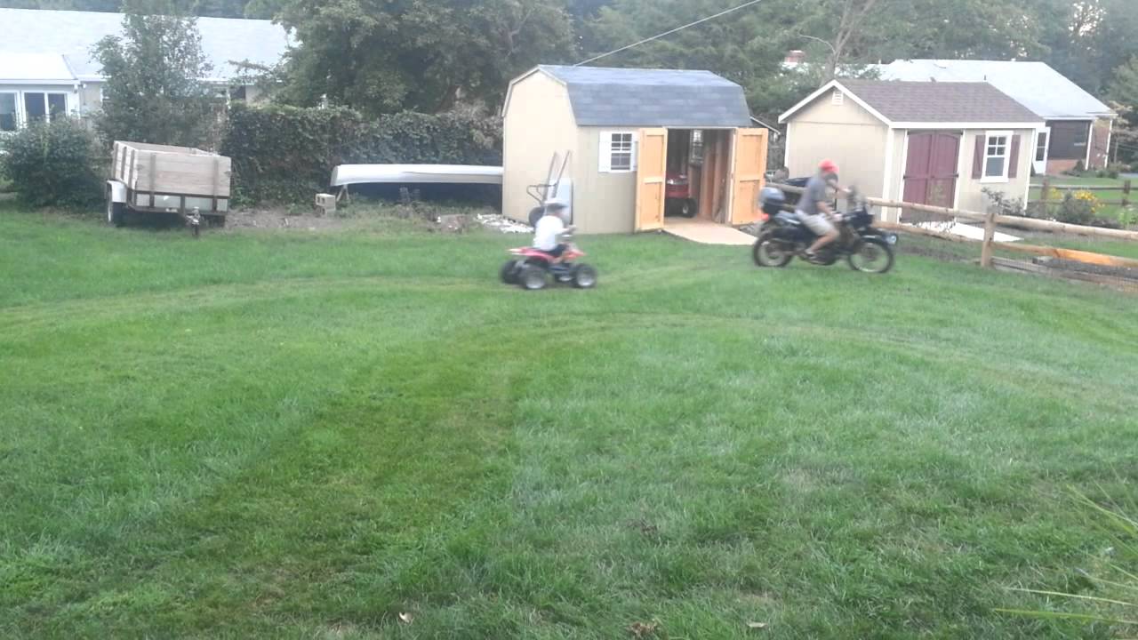 Backyard race - KLR650 vs. Razor 4-wheeler (quad) - YouTube