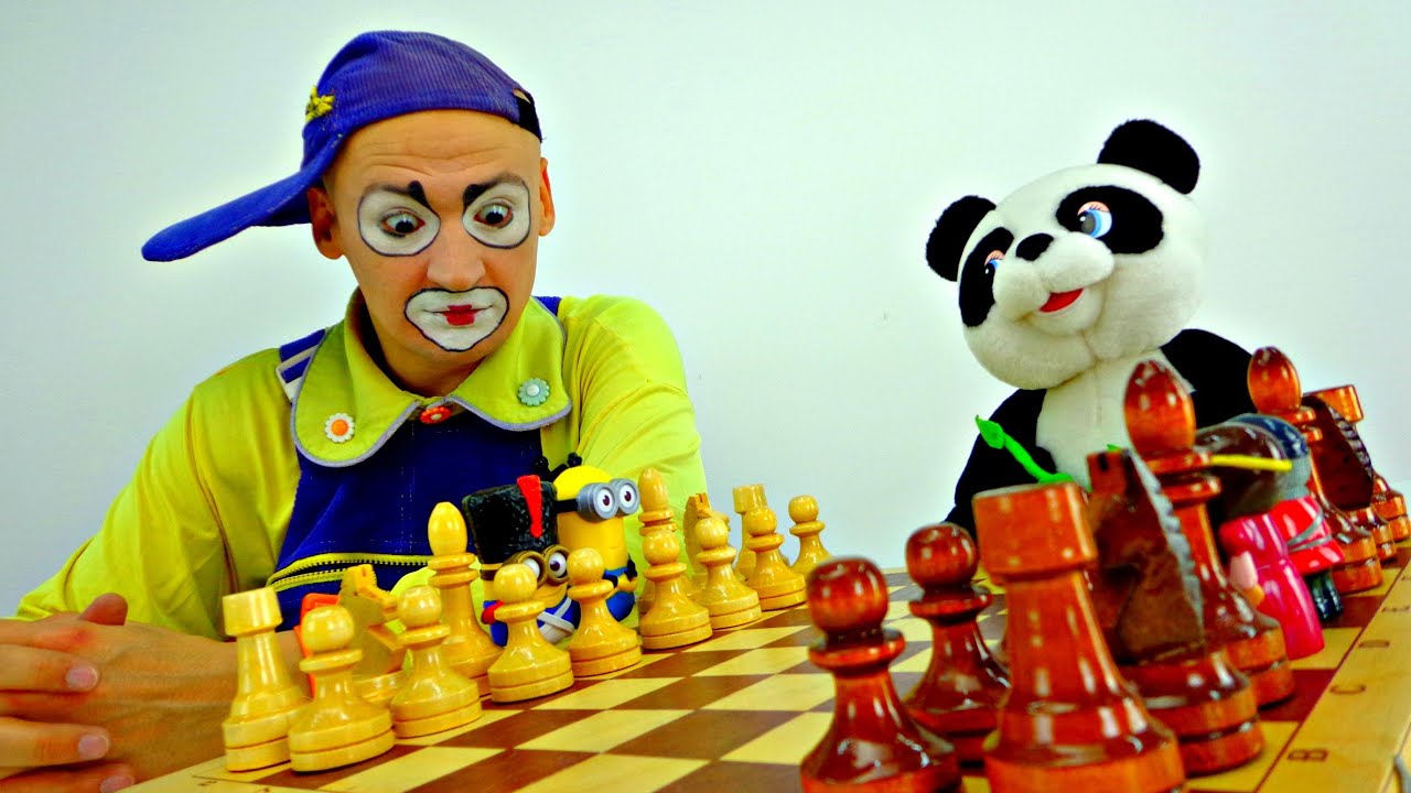 Clown Andrew and a toy Panda play checkers. - YouTube