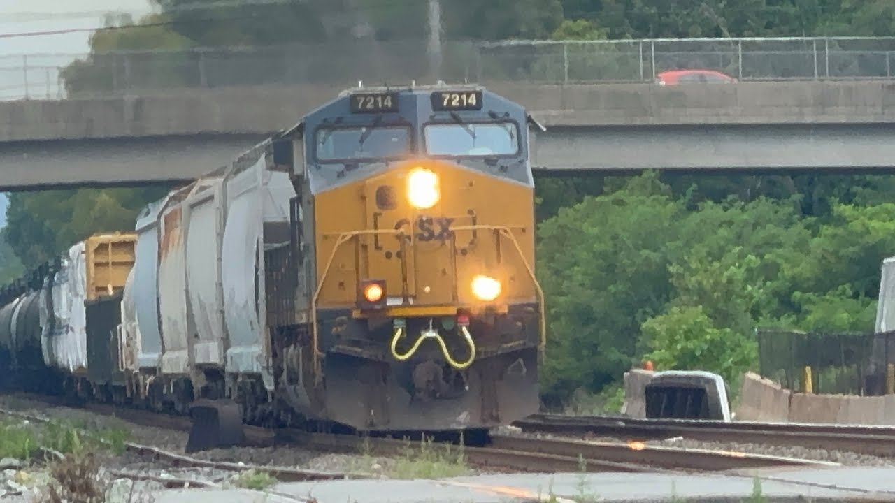 CSX 7214 CM44AH leads CSX M300 through Manville NJ with a shave and a ...