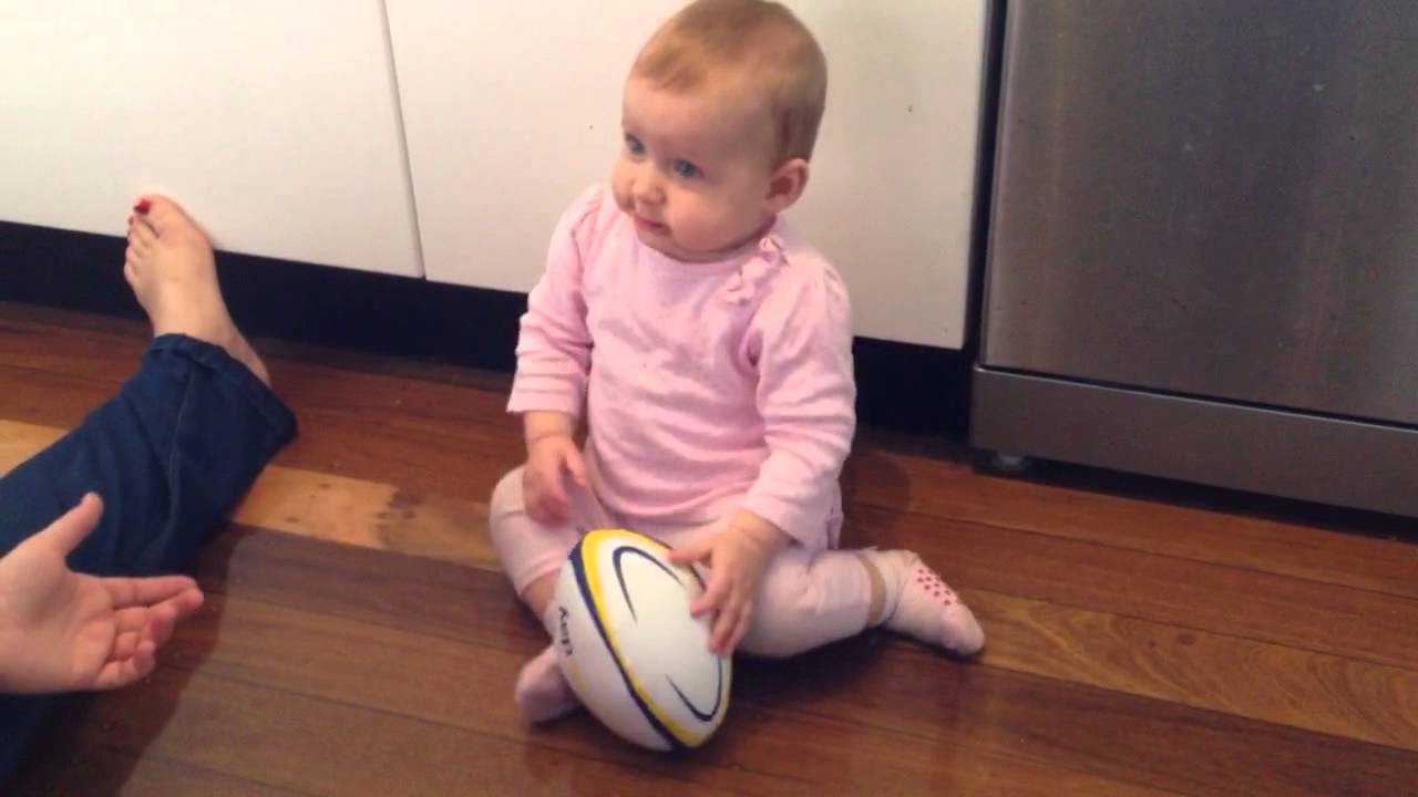 Lyra plays with the football - YouTube