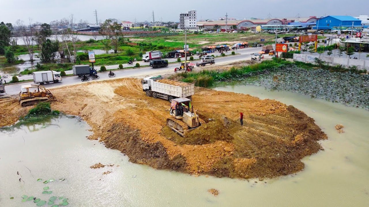 UPDATE Great Team work! LAND Fill up Processing Dump Truck with Dozer ...