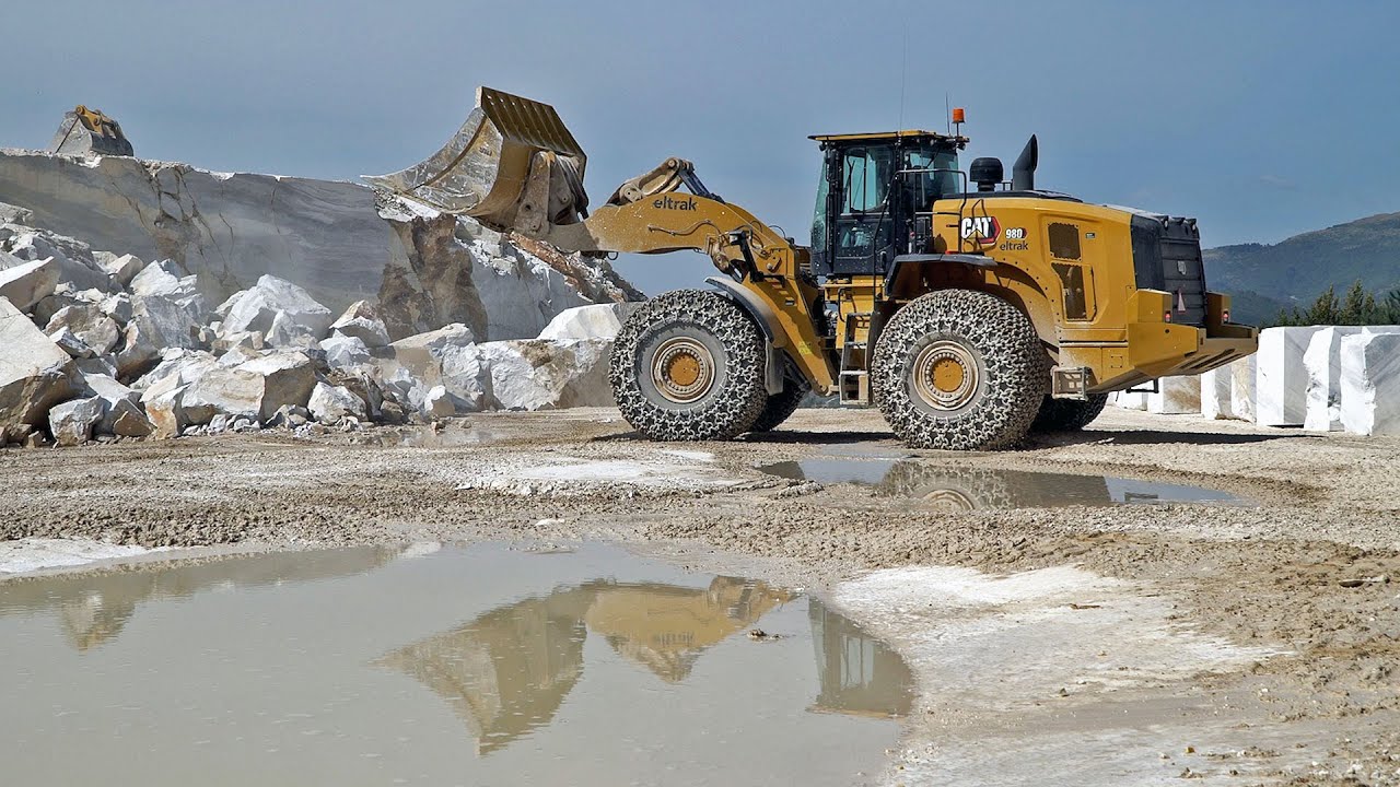CAT 980 Wheel Loader Handling Rock Resistance in Marble Quarry - YouTube