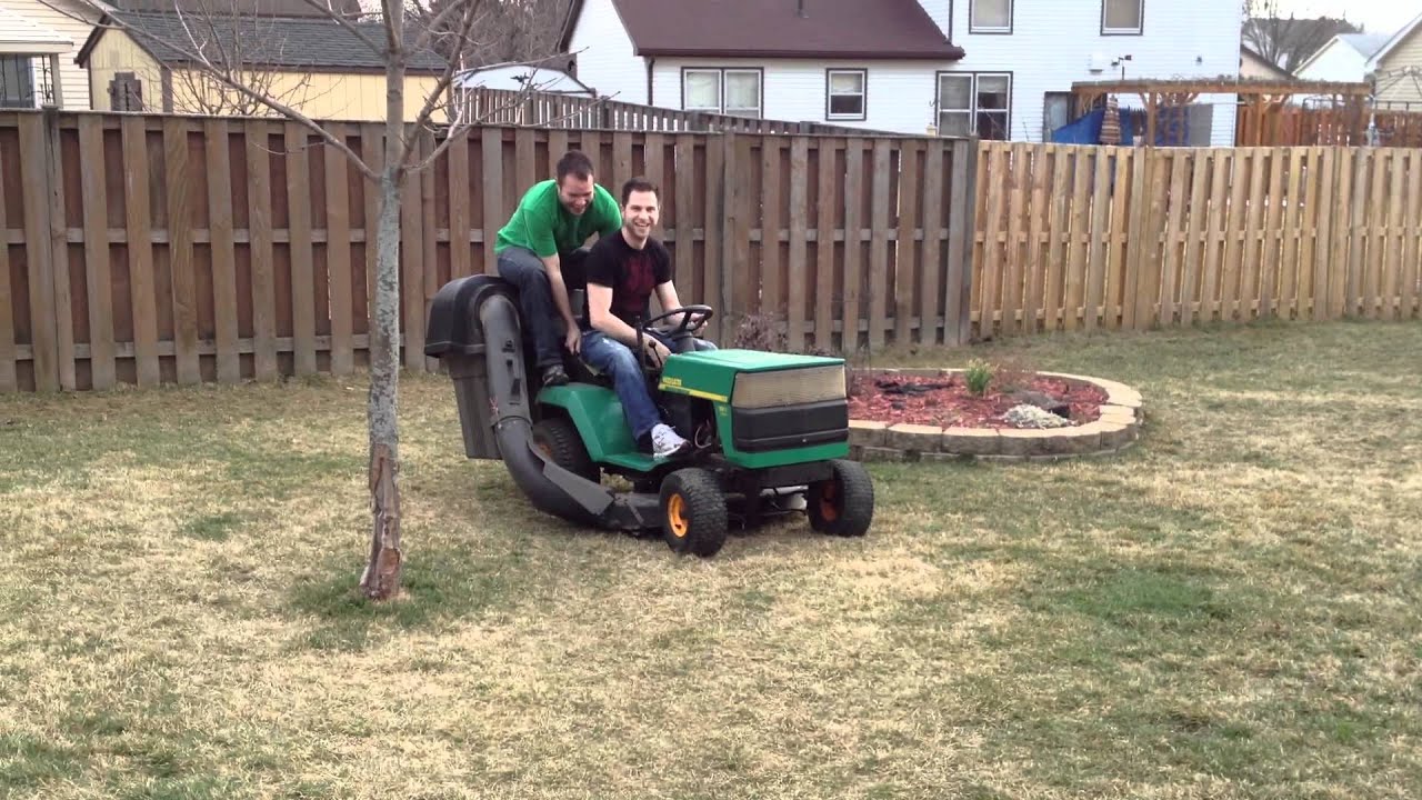 insane two person tandem lawn mower tractor wheelie wipeout - YouTube