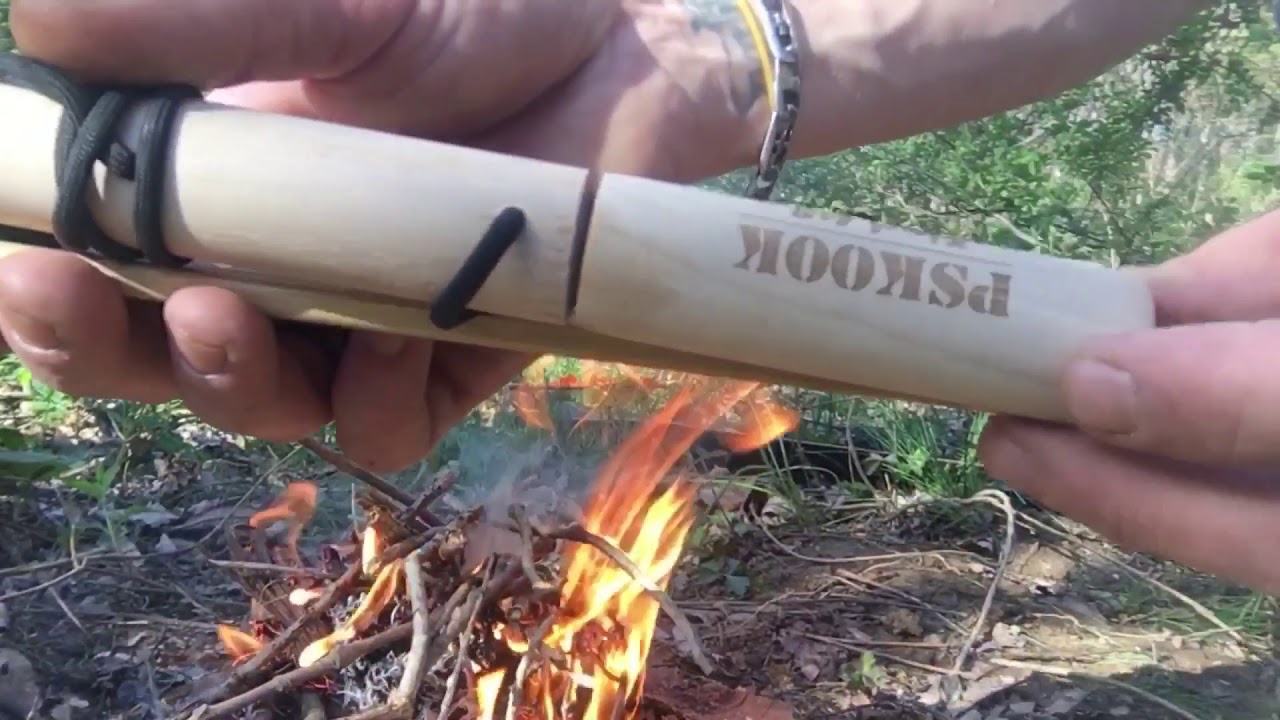 Friction fire and prepping for the next fire. - YouTube