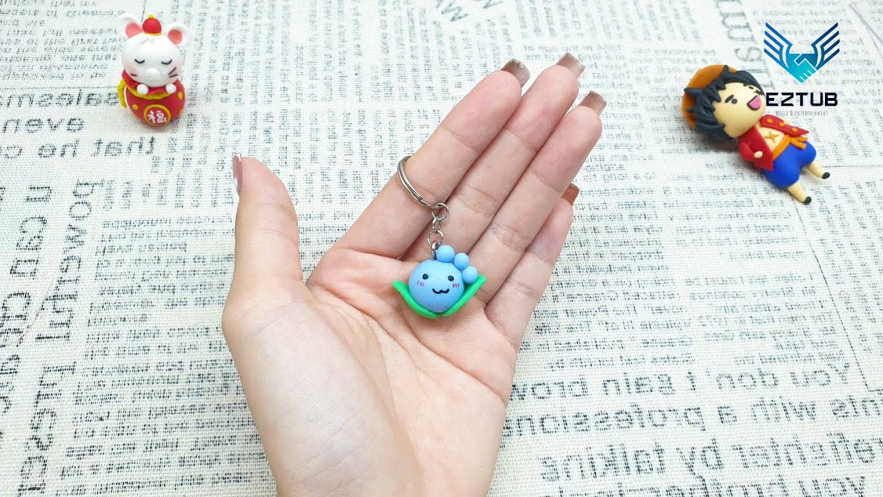 Delightful Encounters: Green Radish Keychain Surrounded by Loving Green ...