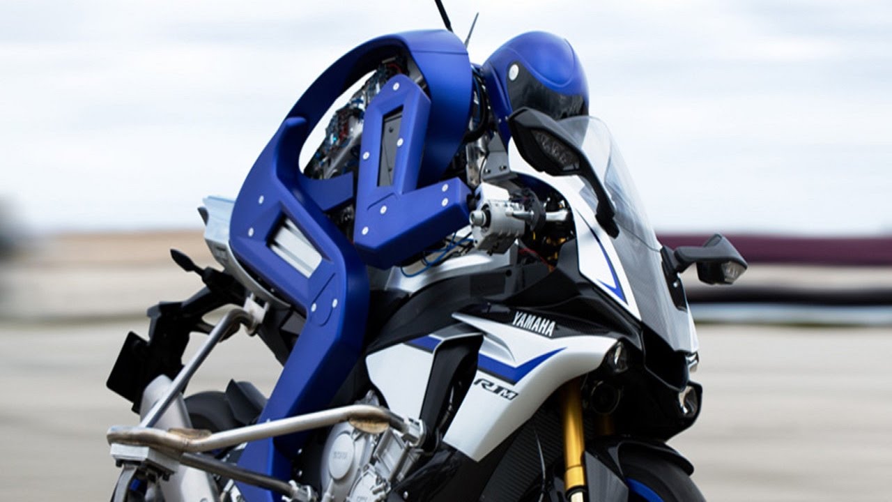 Yamaha shows Motobot motorcycle riding humanoid robot - YouTube