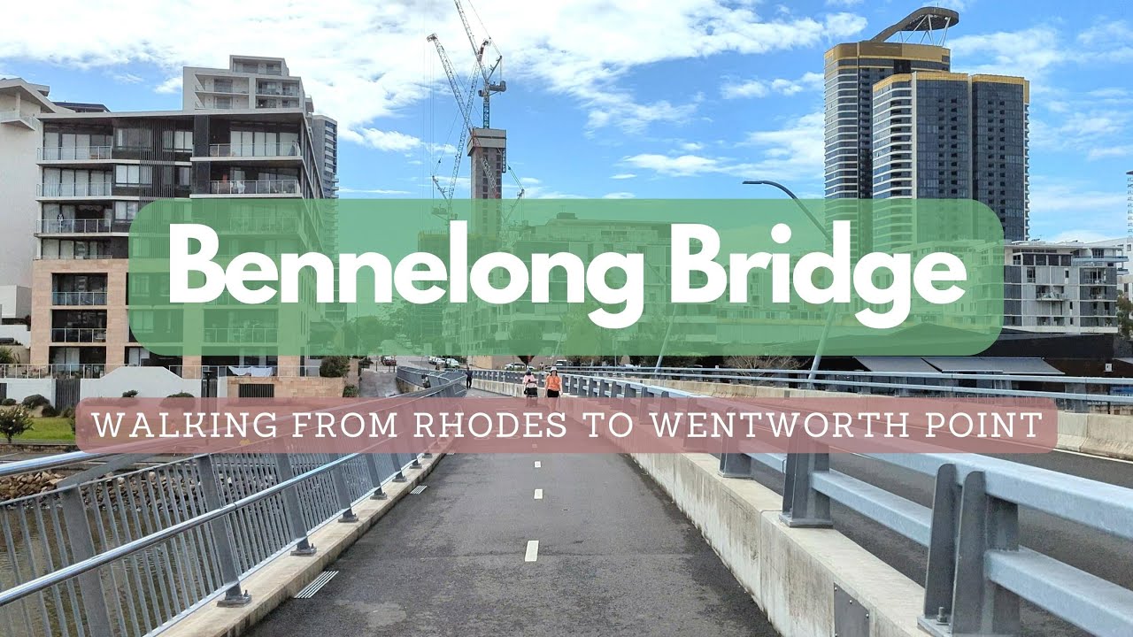 Walking across Bennelong Bridge from Rhodes to Wentworth Point, with ...