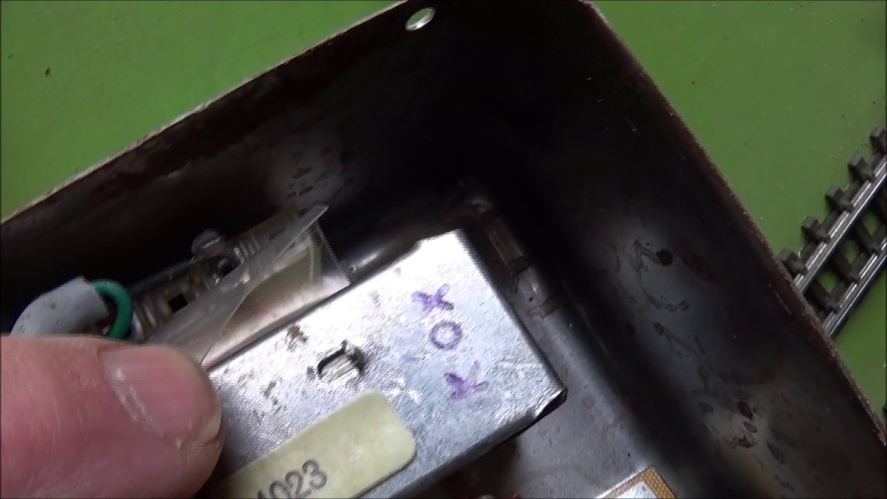 Why, er, why err, wire Looking inside an old model railway controller ...