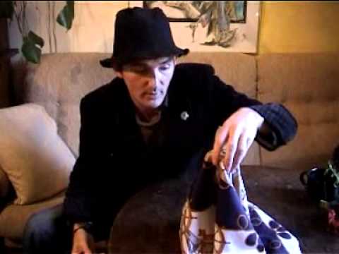 Bottle through table Magic Trick tutorial - YouTube