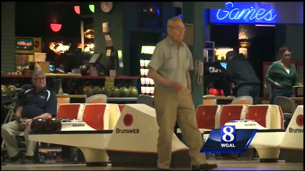 100-year-old bowler lets the good times 'roll' - YouTube