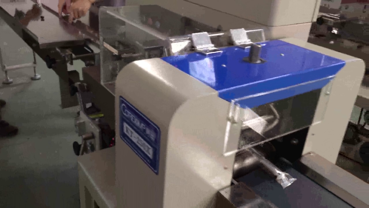 Tube packing machine - YouTube