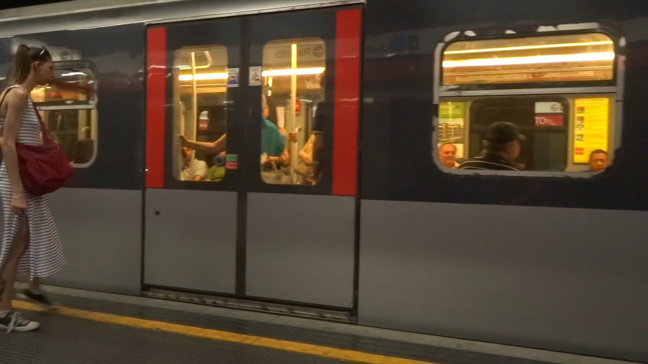 Milan Metro Line M1 train arriving and departing Lotto - YouTube