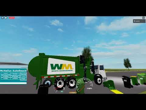 WM Volvo WX McNeilus Autoreach Picking Up Trash. - YouTube