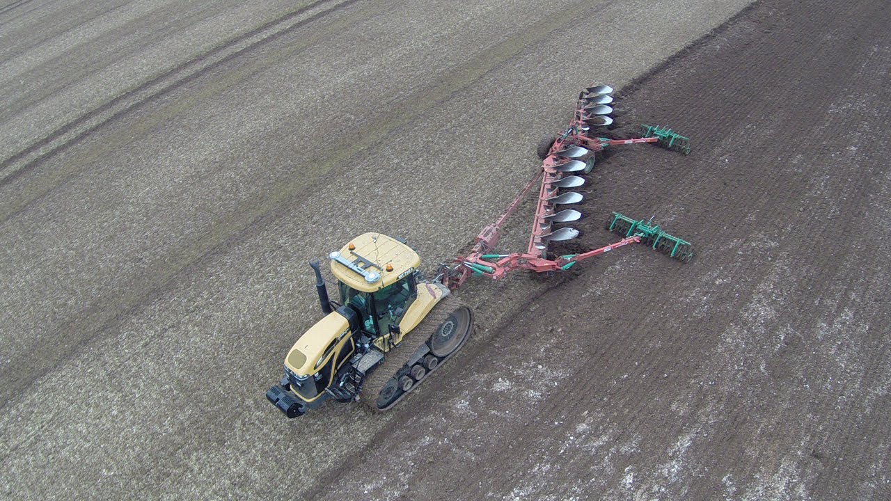CAT Challenger 765c and Kverneland 10 Furrow Plough - YouTube