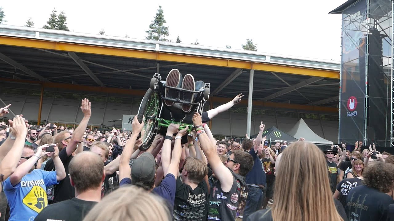 Actual wheelchair-metal crowdsurfing - YouTube