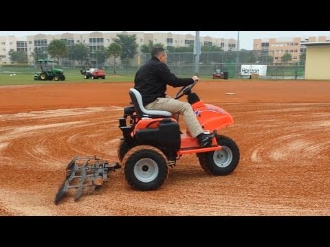 Field conditioner conditioning a ball field infield - YouTube