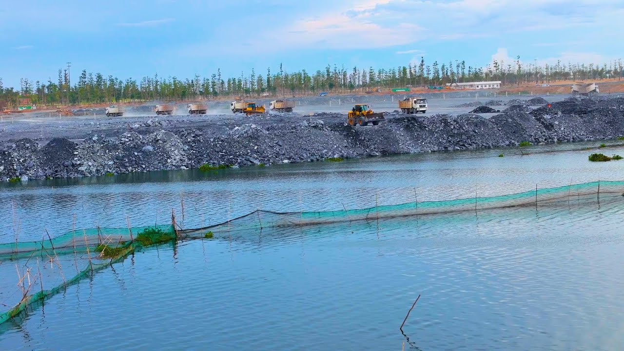 Great !A large scale development project to fill an old lake with rock ...