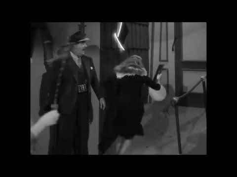 Two extras and Martha Raye deal with the windy blowhole -  Keep 'Em Flying (1941)