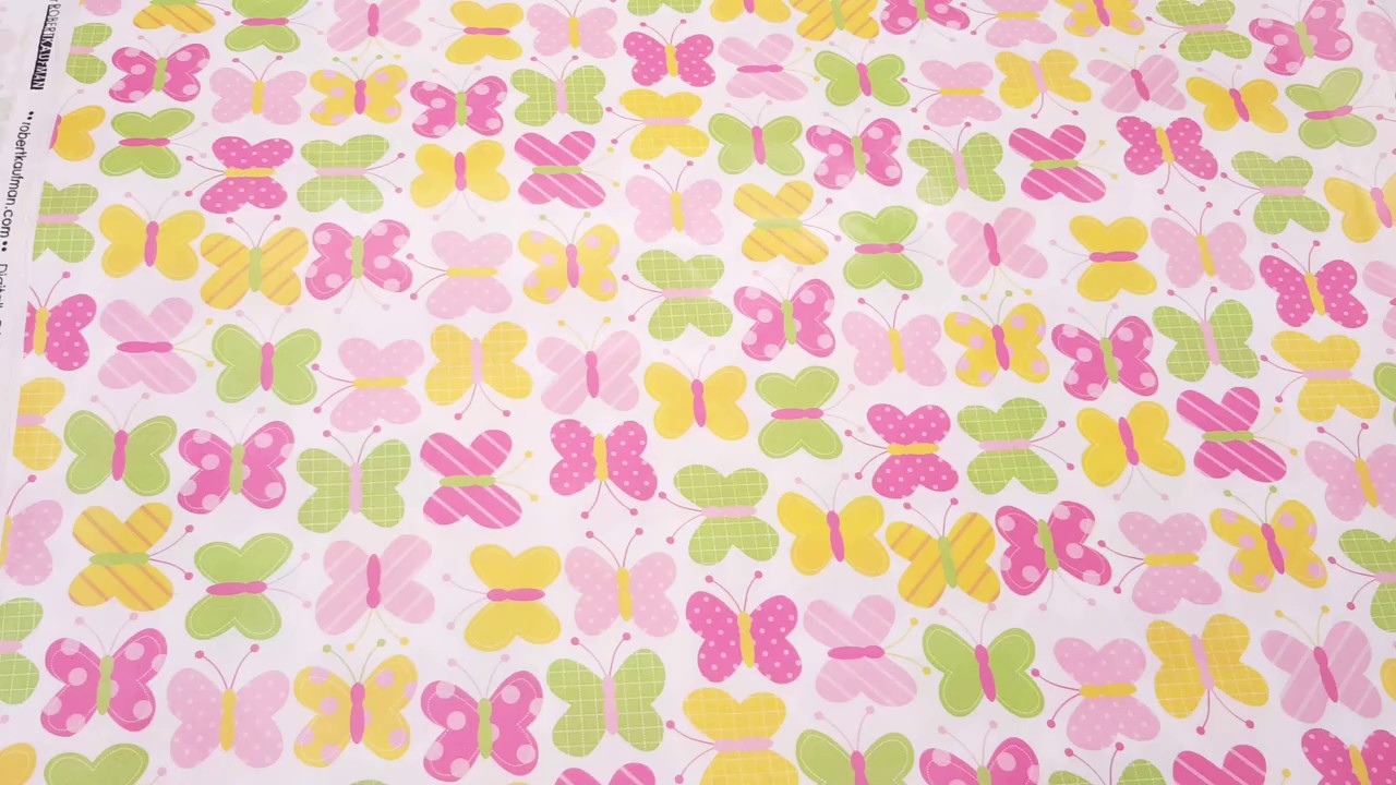 white laminate fabric with butterflies by Robert Kaufman - YouTube
