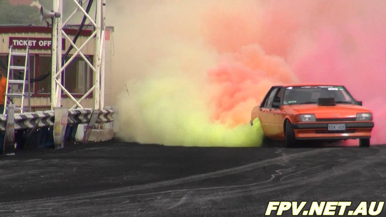FORD V8 XE COLOURED SMOKE BURNOUTS AT SUMMERNATS 25 - YouTube