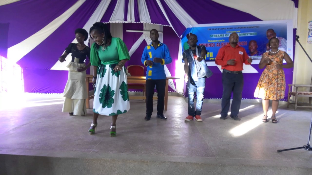 Joan Bulimo perfoming live Mshindi Album at Friends church Nabongo ...